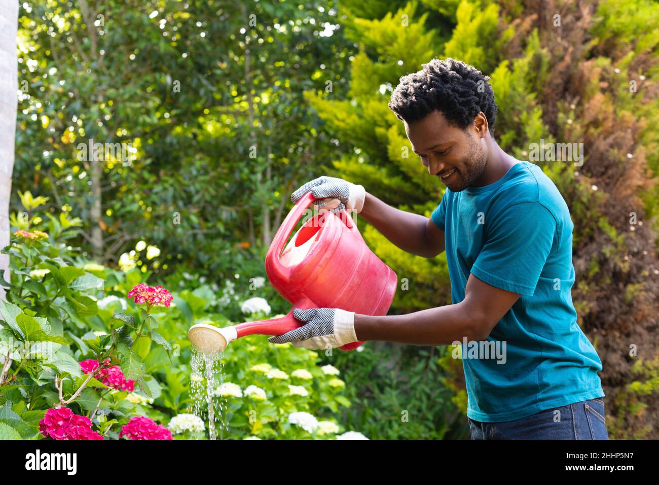 Man Watering Plants