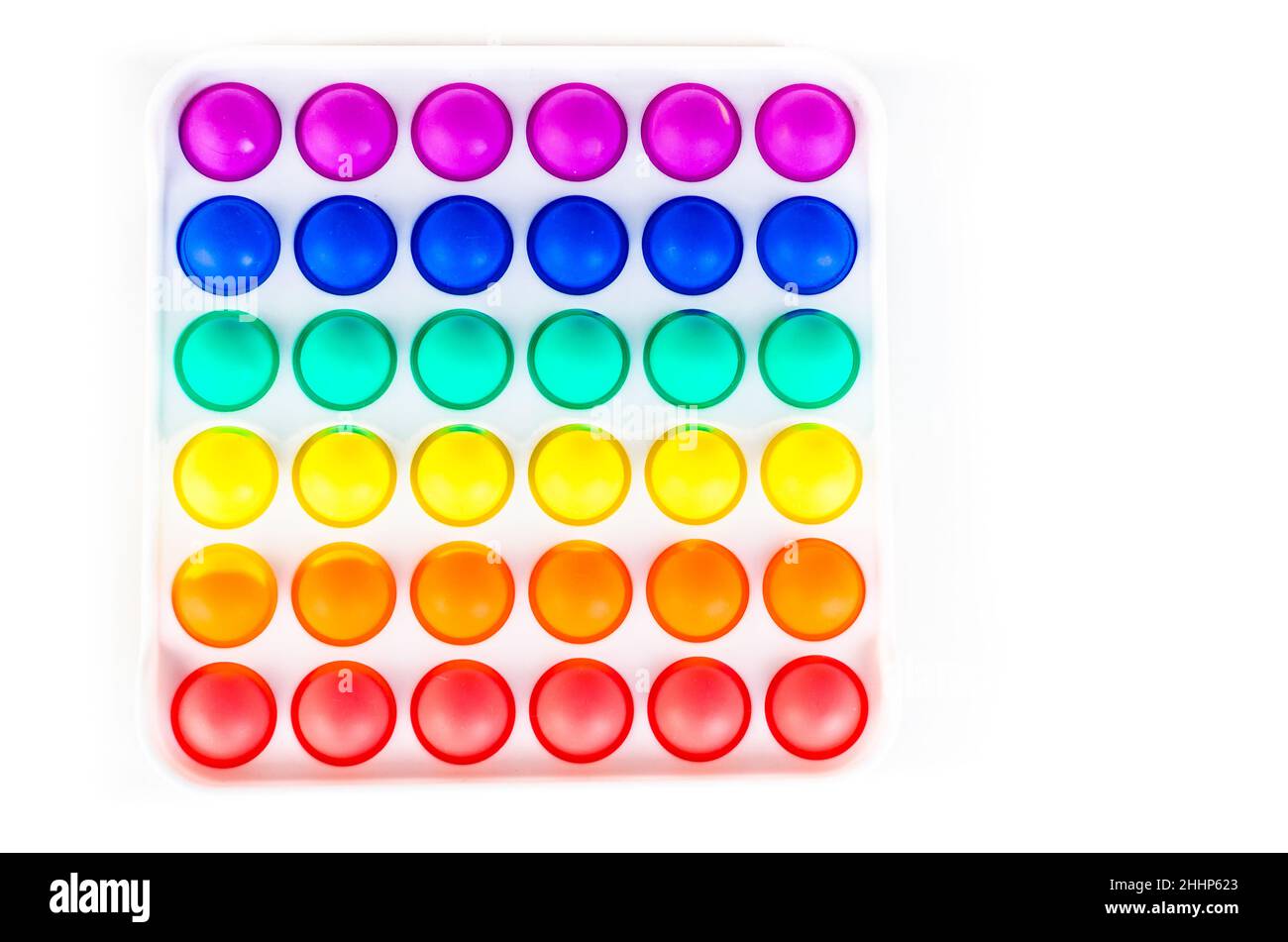 Closeup of an antistress fidget toy Pop It on a white background Stock ...