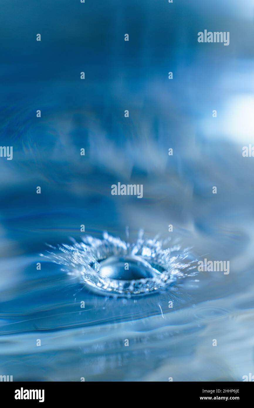 Water droplets make an impact when hitting the surface Stock Photo - Alamy