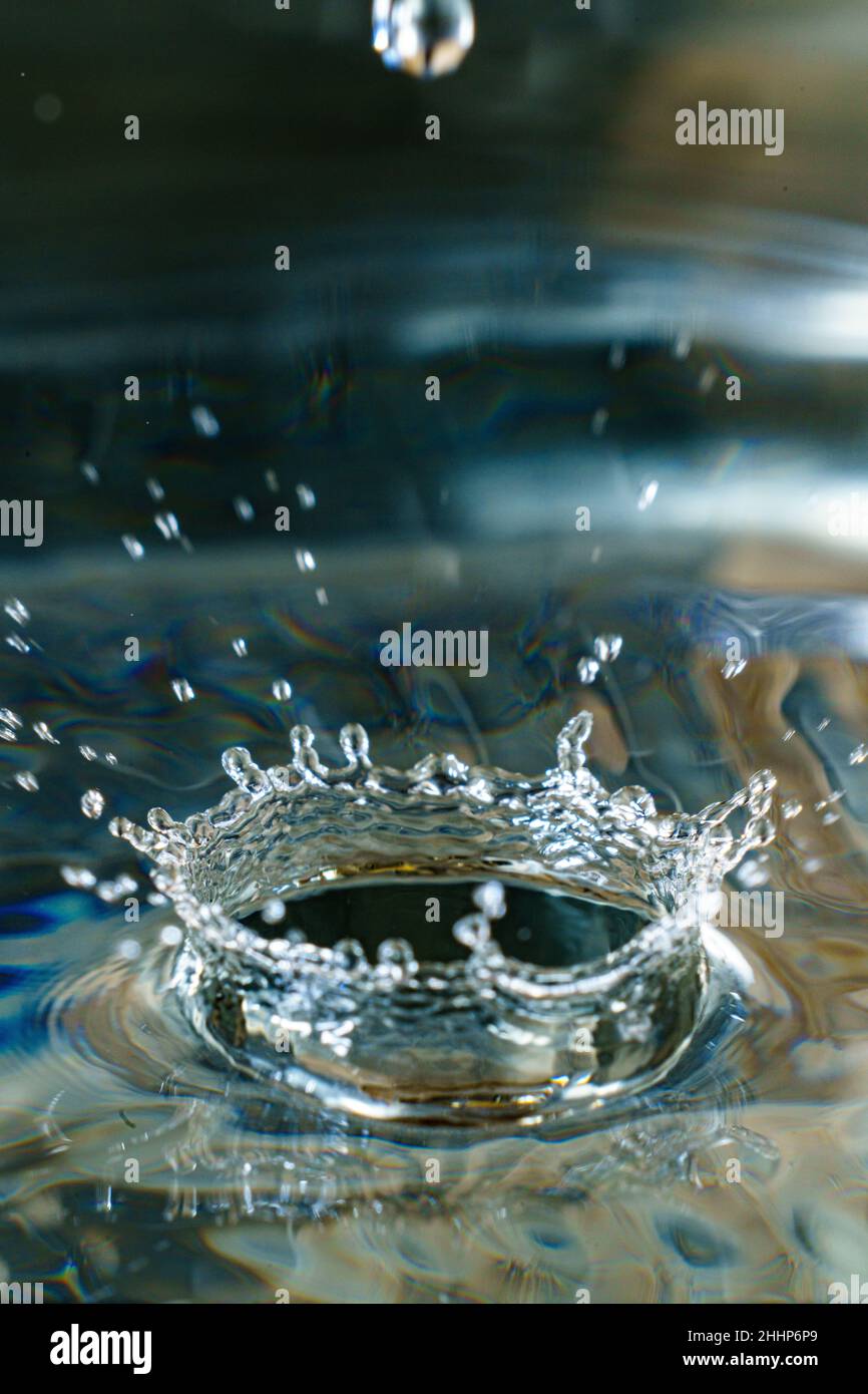 Water droplets make an impact when hitting the surface Stock Photo - Alamy