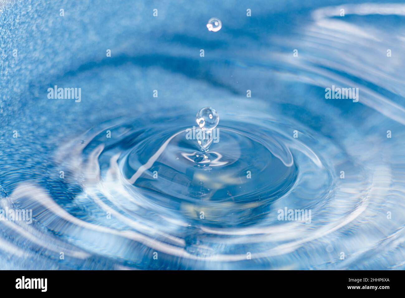 Water droplets make an impact when hitting the surface Stock Photo - Alamy