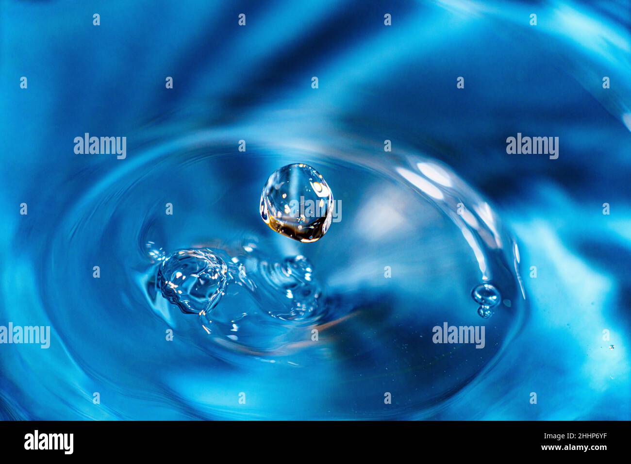 Water droplets make an impact when hitting the surface Stock Photo - Alamy