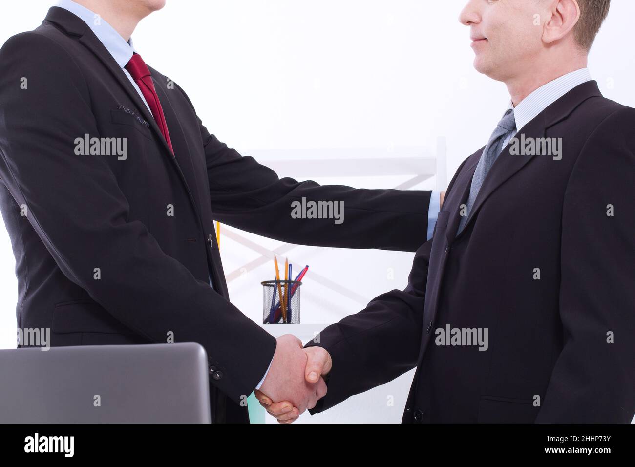 Successful business partnership concept with businessmans handshake at ...