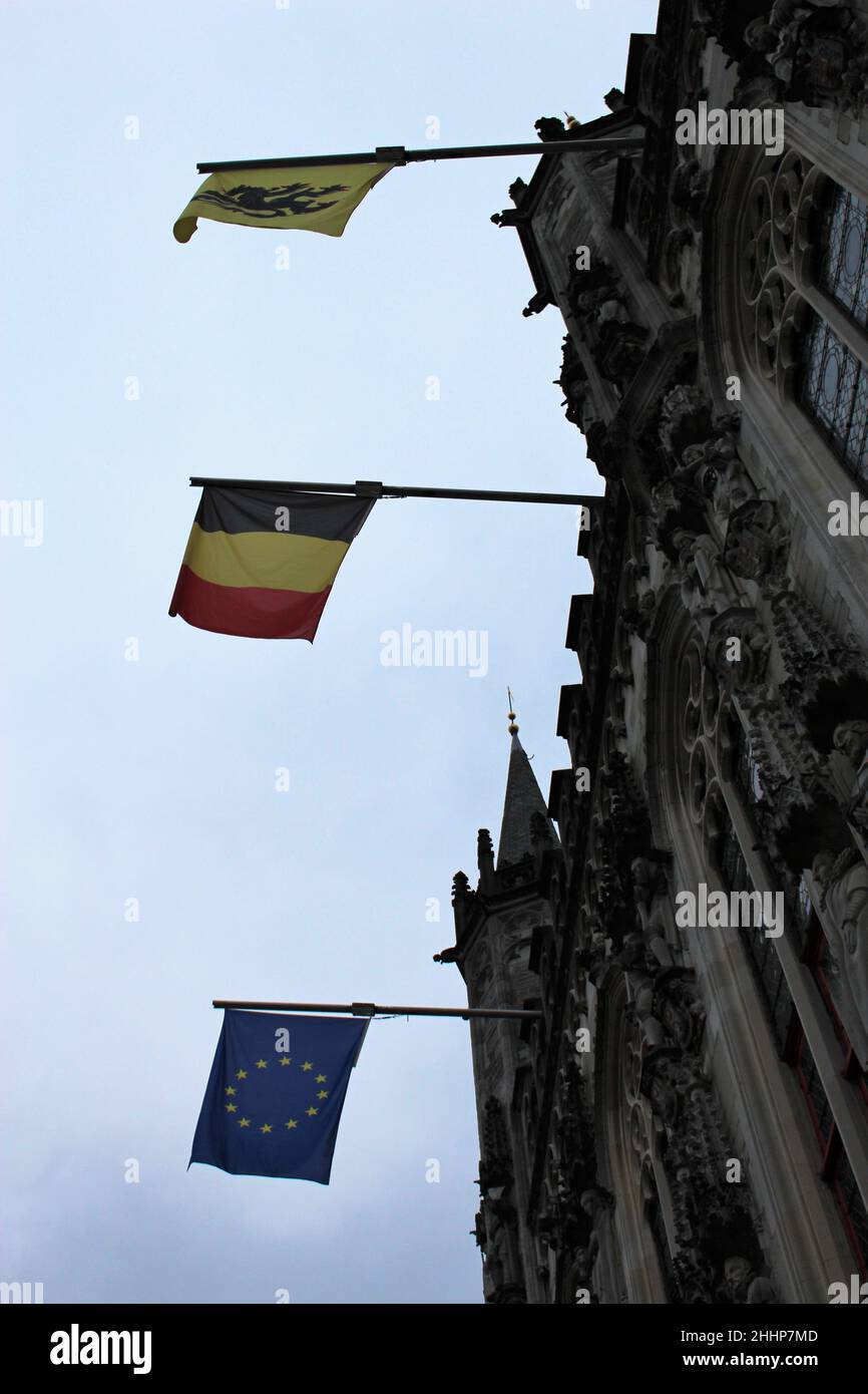 Flags of Flanders, Belgium and the EU outside the city hall (Bruges ...