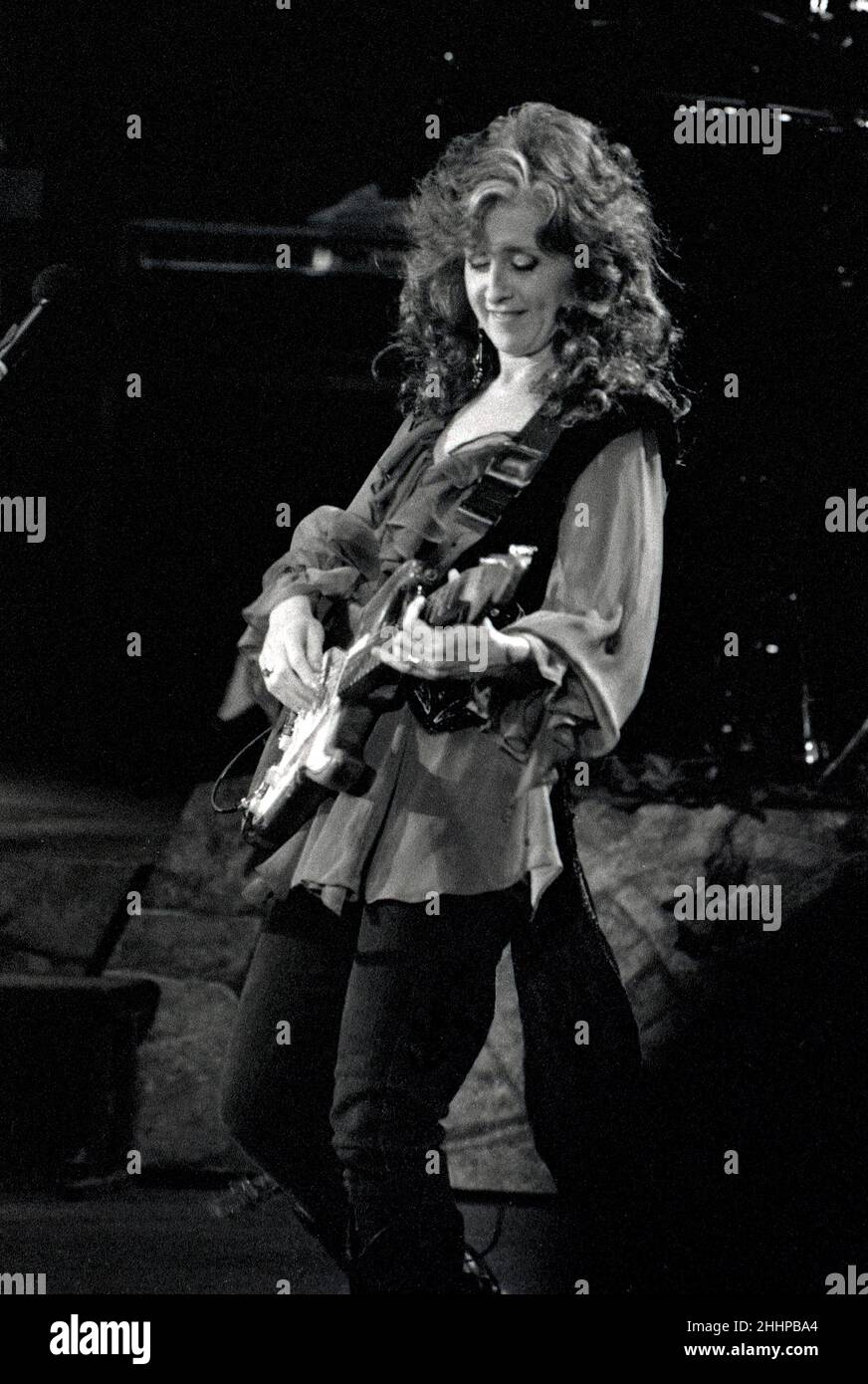 Bonnie Raitt performs on stage with her guitar circa 1991 Credit: Ron ...