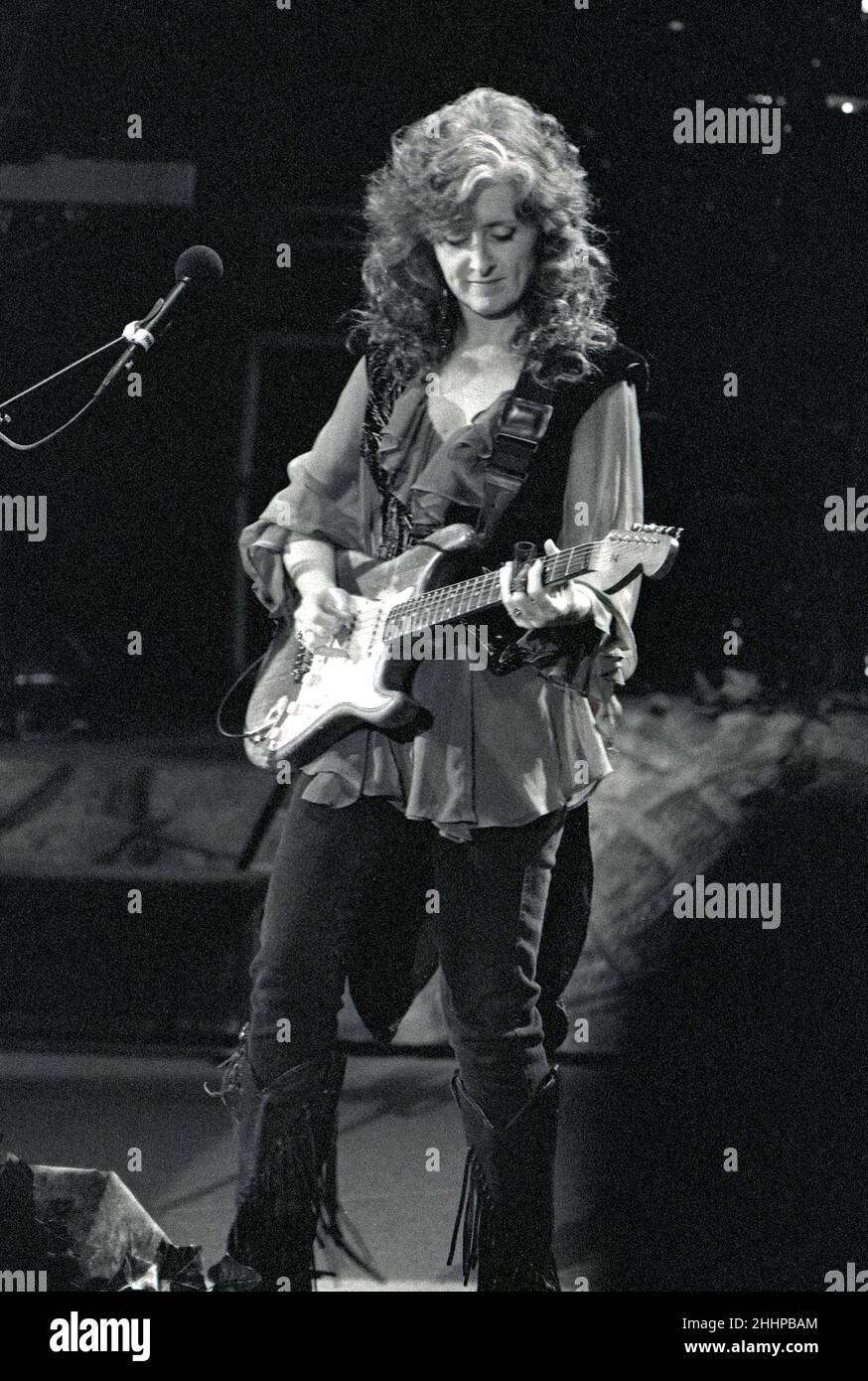 Bonnie Raitt performs on stage with her guitar circa 1991 Credit: Ron ...