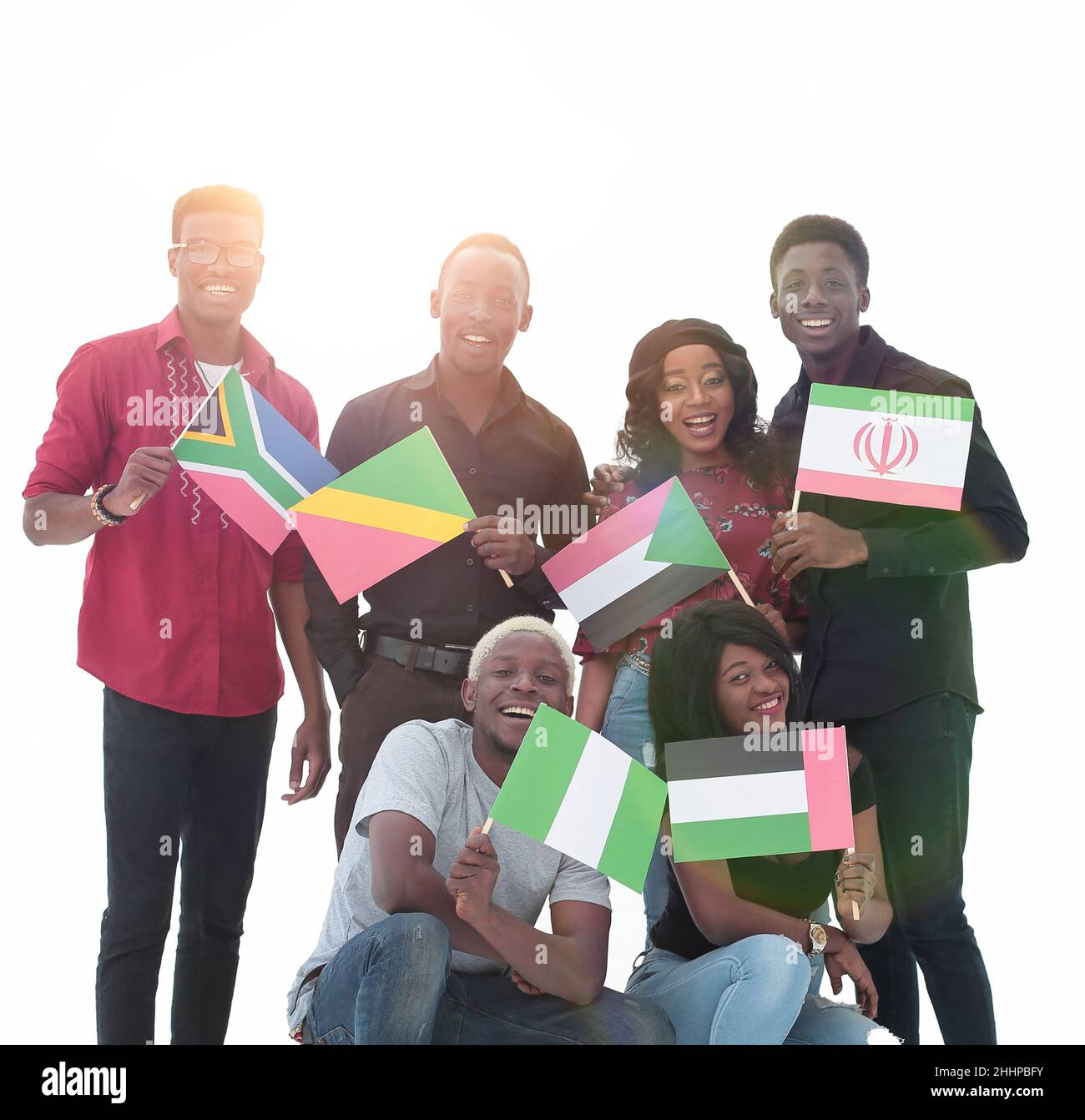 Group of friends with flags over white background Stock Photo - Alamy