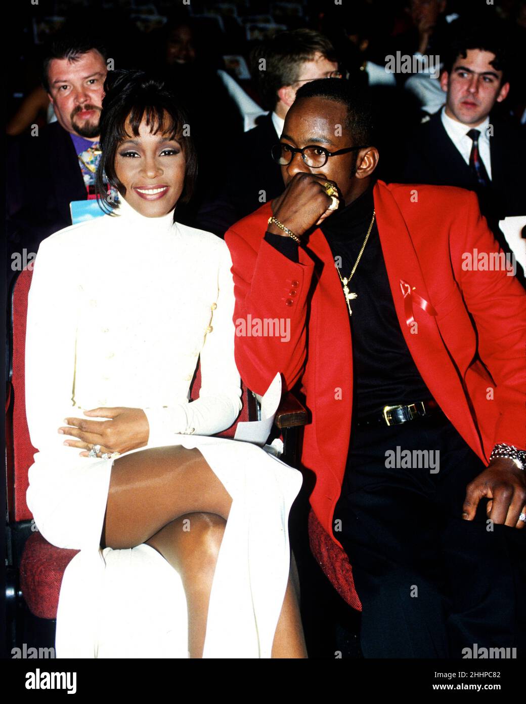 1994 - Whitney Houston & Bobby Brown sitting together at a show in 1994 ...