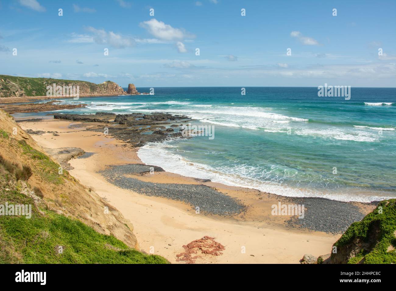 View of the pinnacles on Cape Woolamai Surf Beach and blue waters of ...