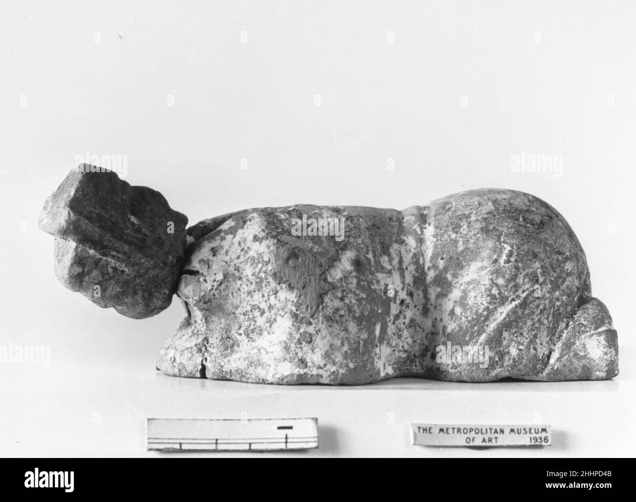 Kowtowing figure with movable head China. Kowtowing figure with movable ...