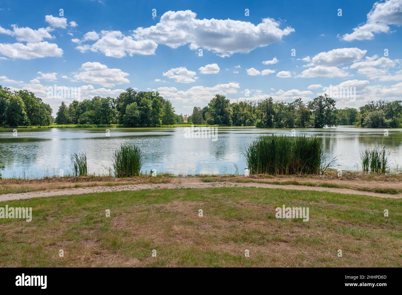 Lednice-Valtice complex, castle pond , park with trees and castle ...