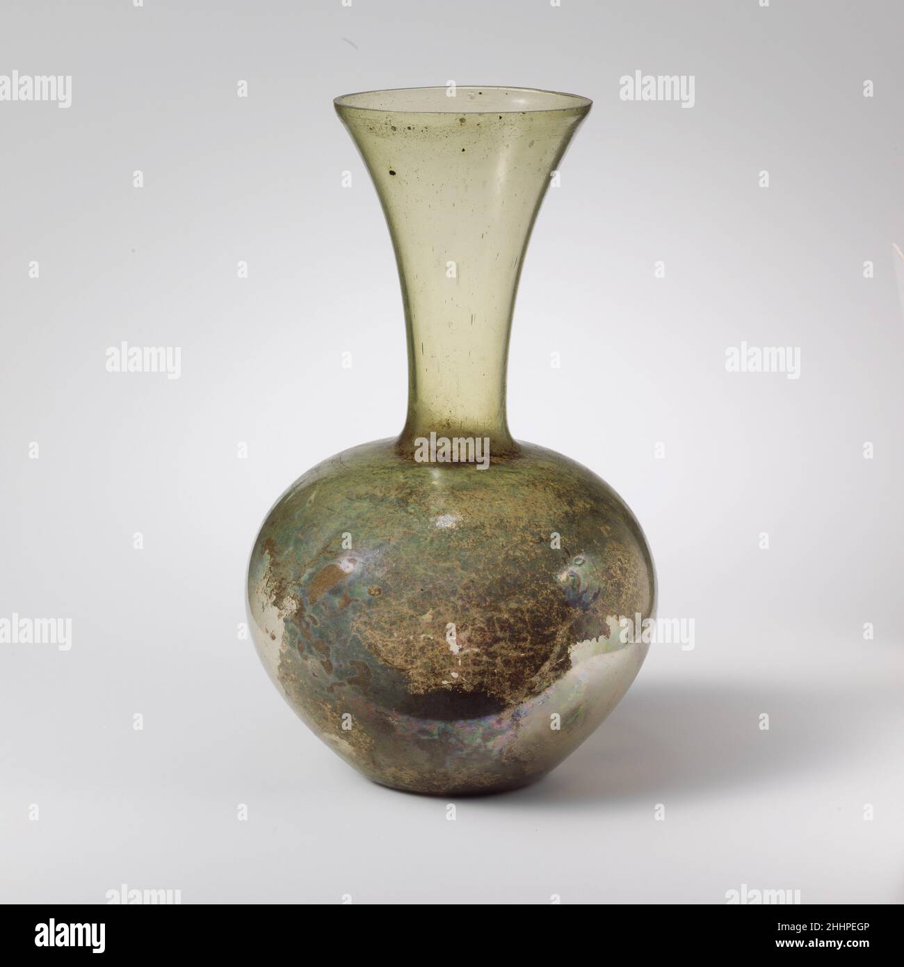 Glass bottle 4th century A.D. Roman Translucent light green.Slightly ...