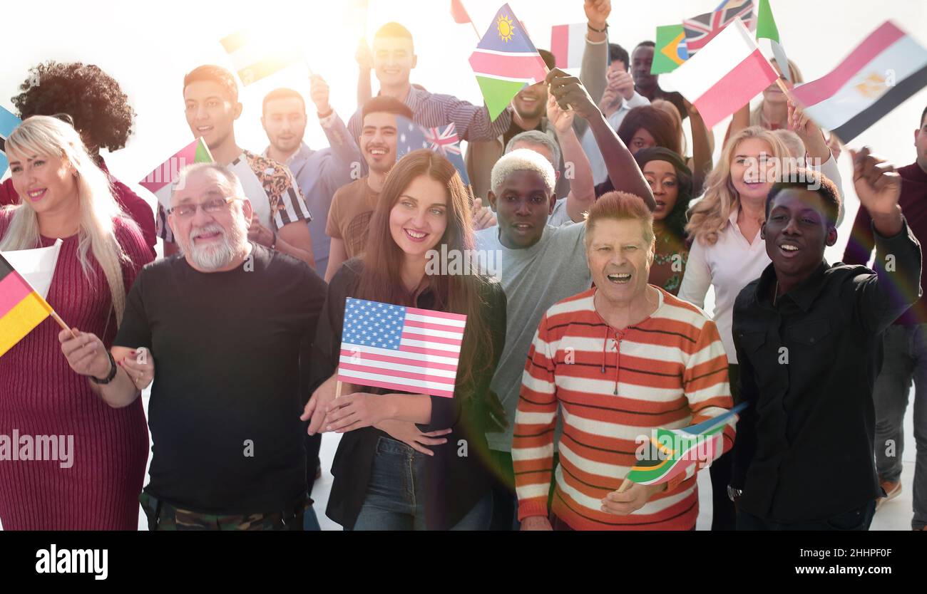 group of people with their national flags walking together Stock Photo ...
