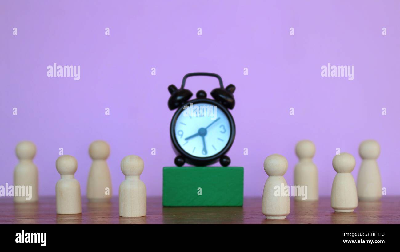 Working Hours Hourly Wages Deadline Concept Alarm Clock And Wooden 