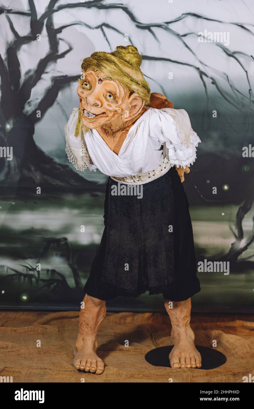 Vertical closeup of a modeled old witch that stole children from old ...