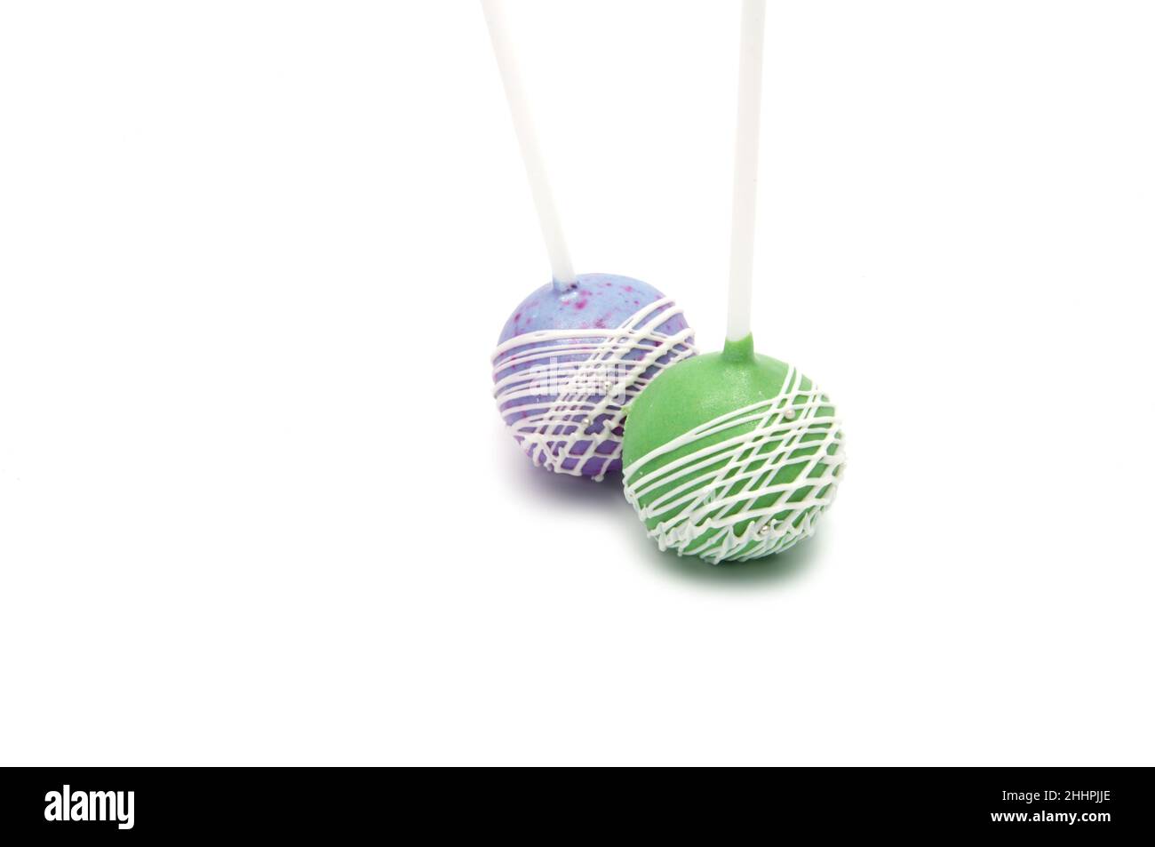 cake-pop color decor on the white isolated Stock Photo - Alamy