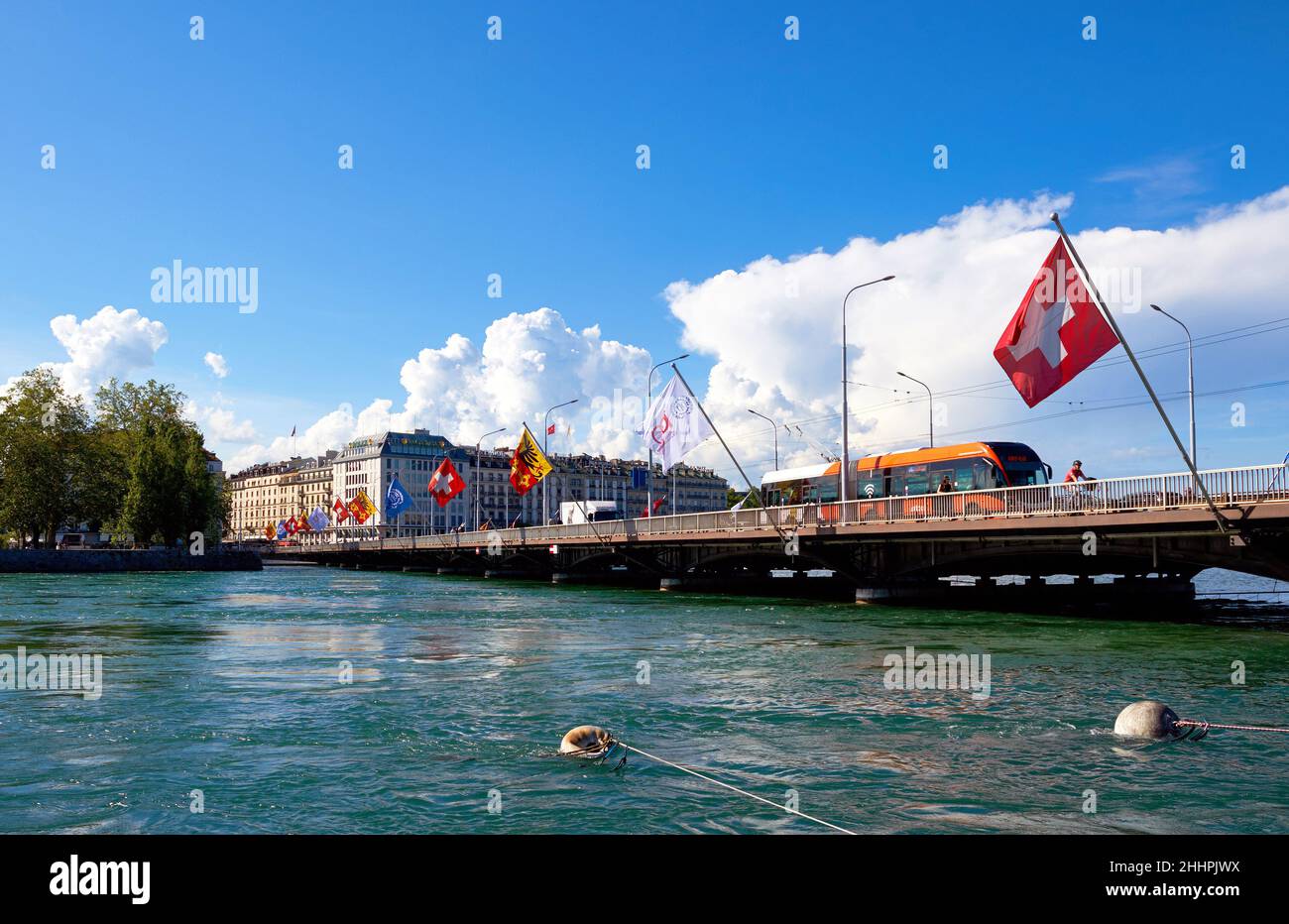 Bridge with the flags in the center of Geneva, Switzerland Stock Photo ...