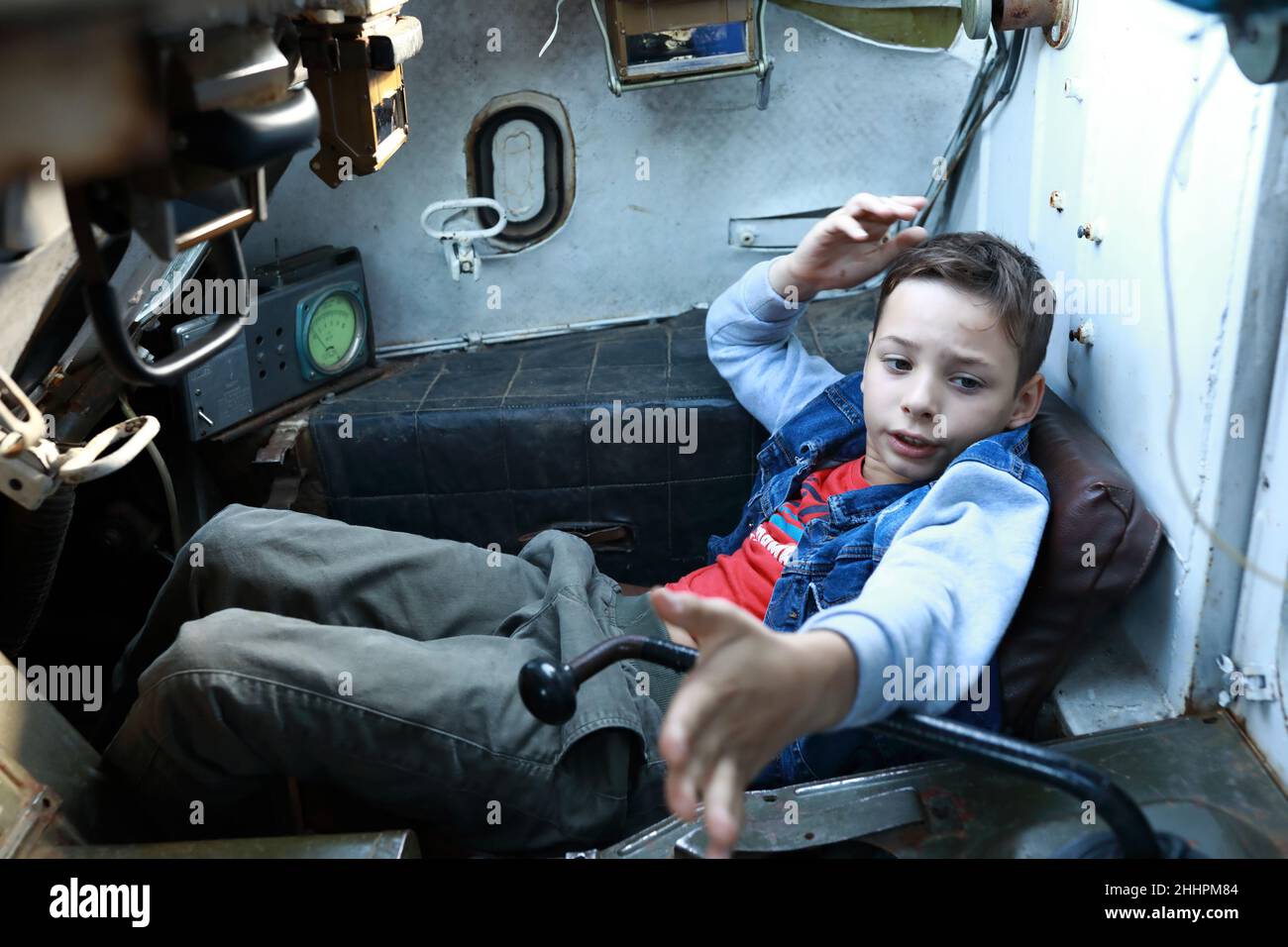 Boy in GT-MU light generalpurpose armored vehicle, Russia Stock Photo ...