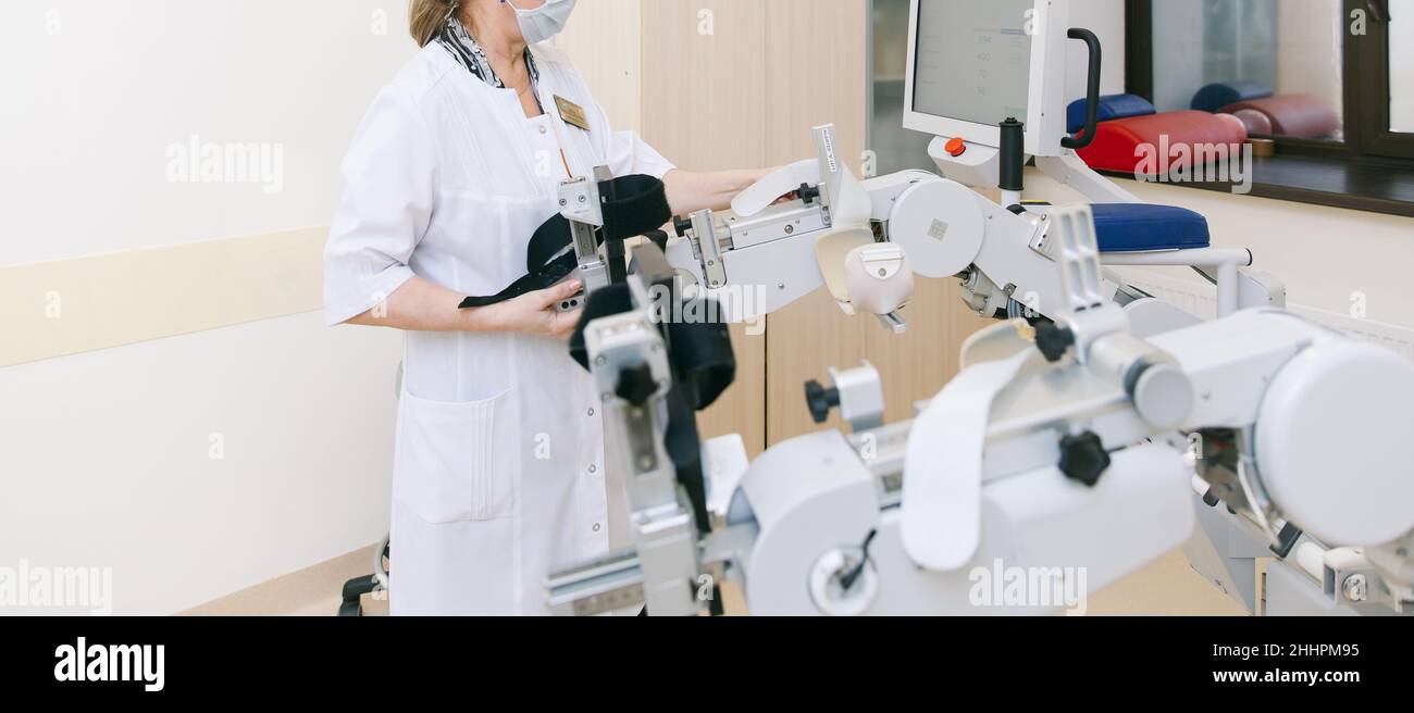 Patient on Continuous Passive Range of Motion machines. Device to ...