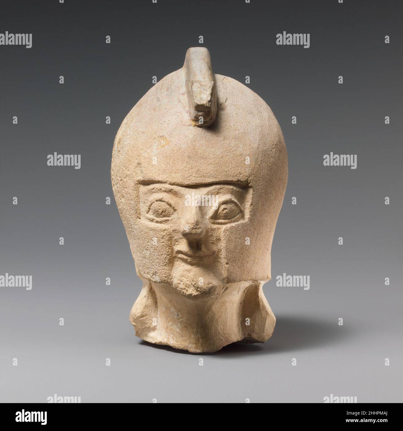 Limestone head of a warrior wearing a crested helmet 5th century B.C ...