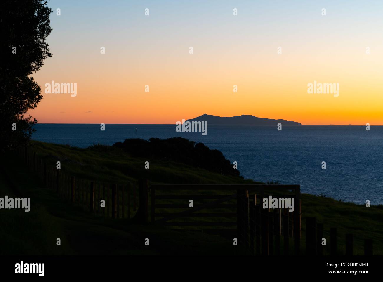 Famous Mayor Island in silhouette on horizon from slope of Mount ...