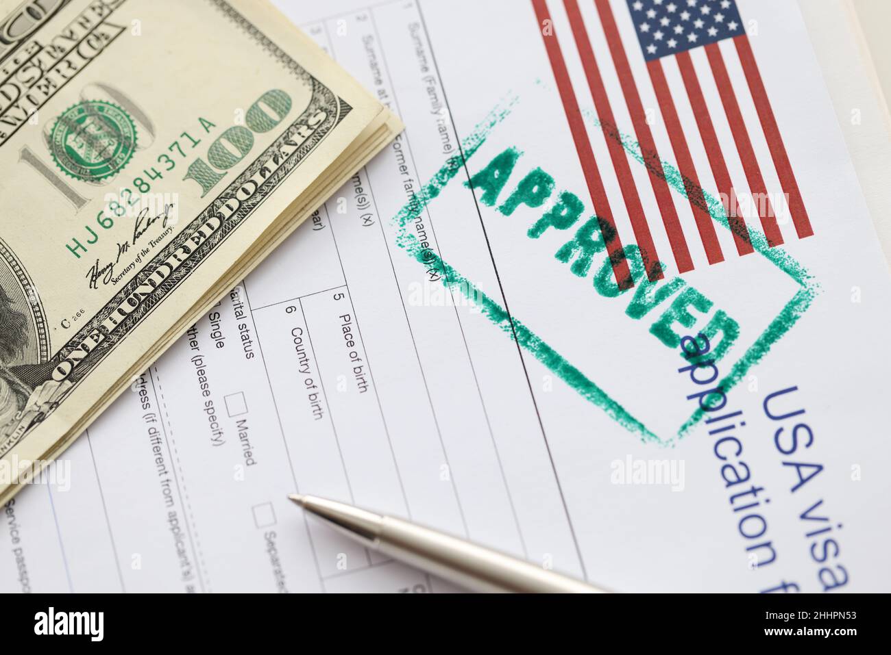 Stamp approved is on documents for obtaining American visa closeup ...