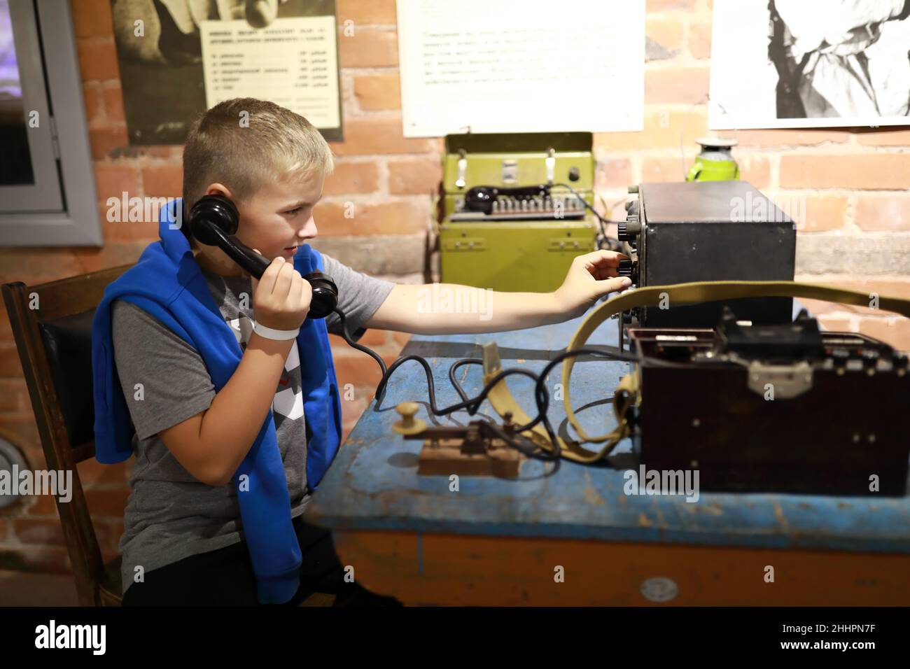 Portrait of child using retro walkie-talkie Stock Photo - Alamy