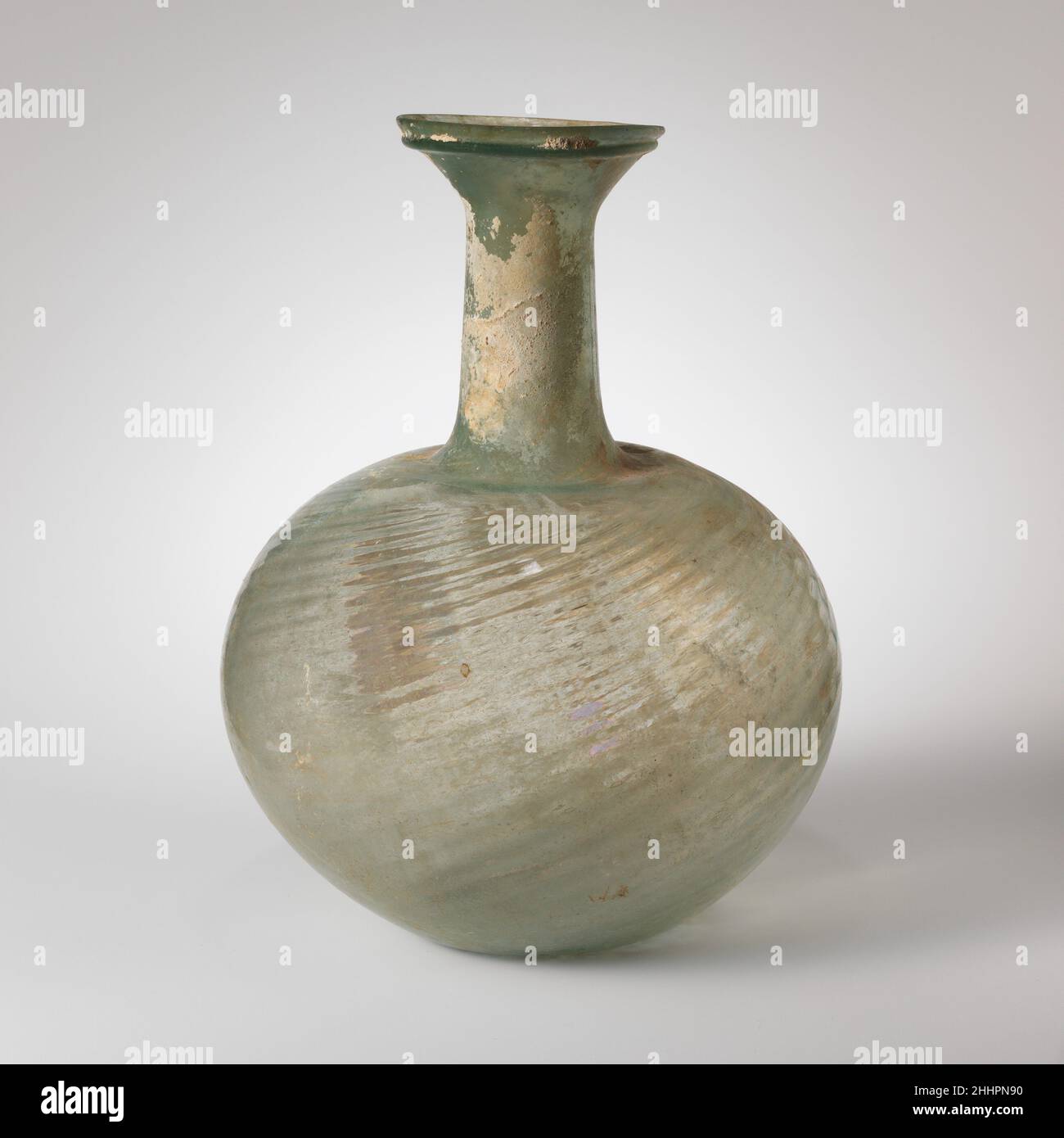 Glass flask 4th century A.D. Roman Translucent blue green.Rounded rim ...