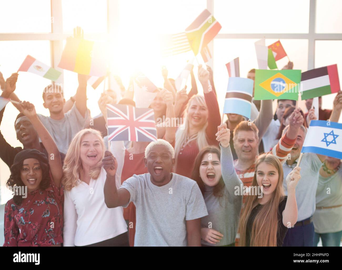 Top view young multi ethnic business people group waving flags Stock ...