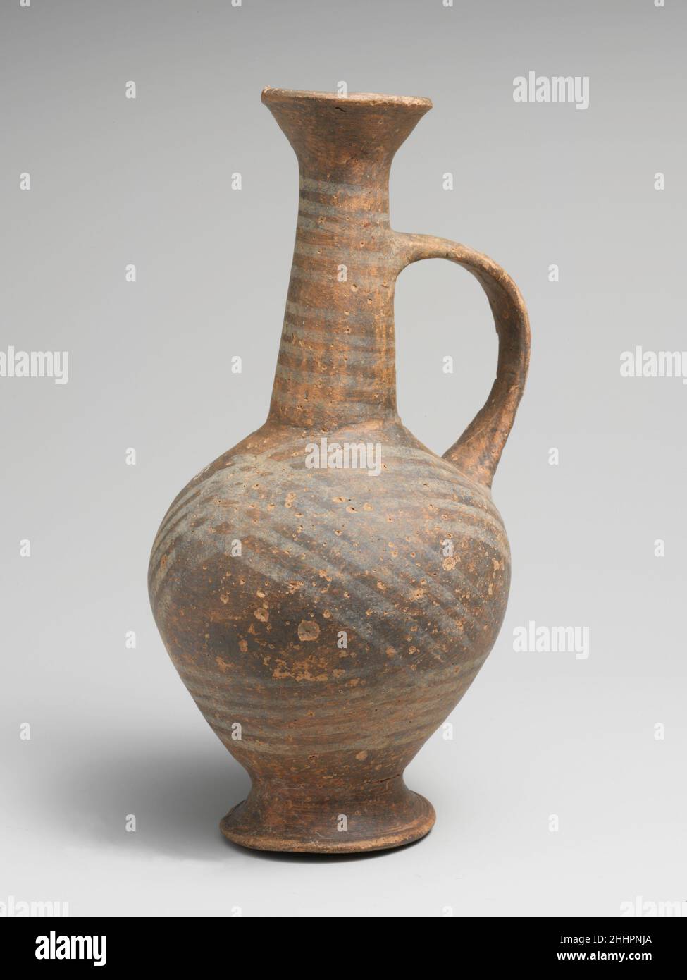 Terracotta jug ca. 1450–1200 B.C. Cypriot Narrow-necked jug with handle ...