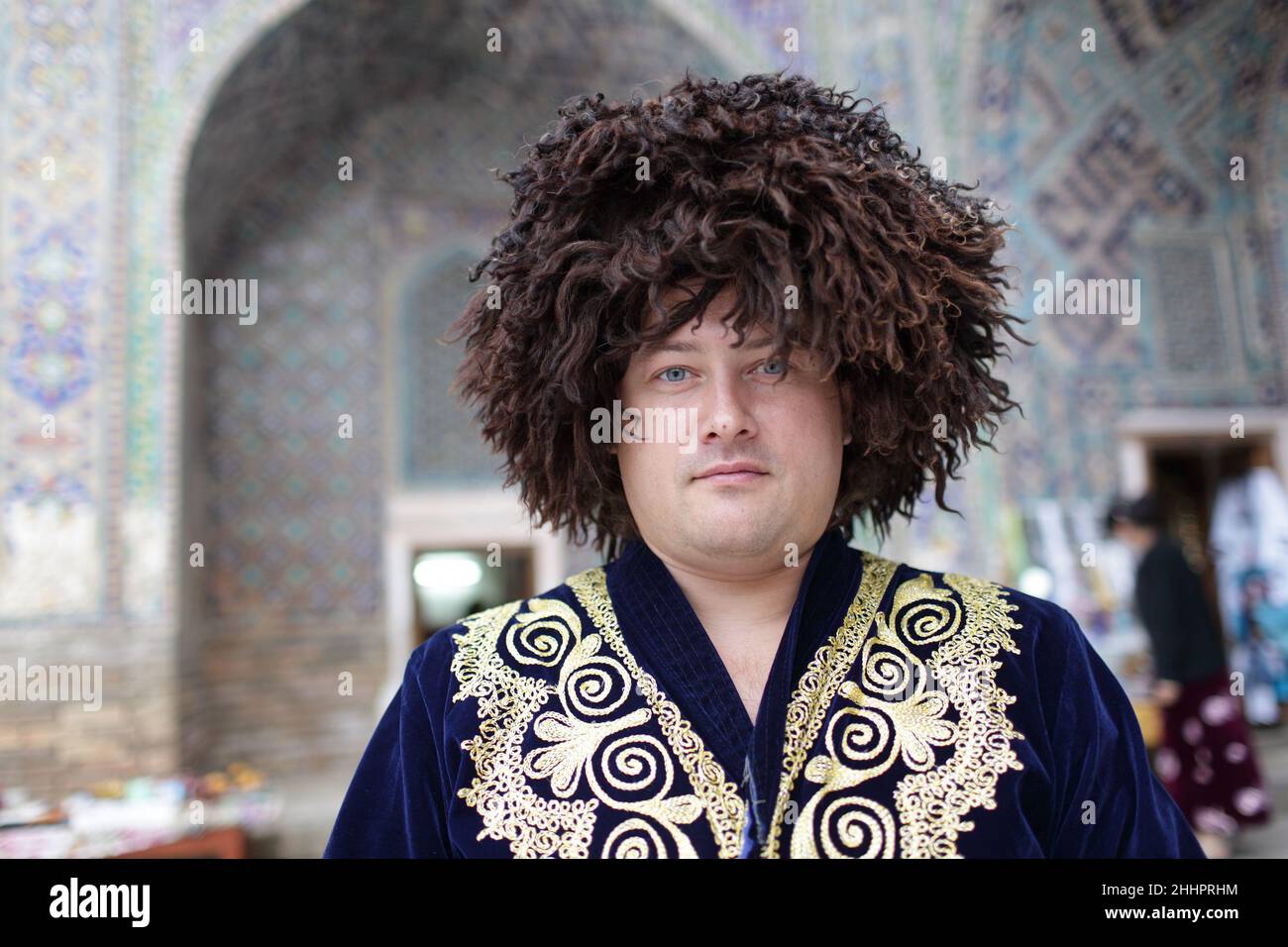 The man poses in uzbek clothes, Uzbekistan, Samarkand Stock Photo - Alamy