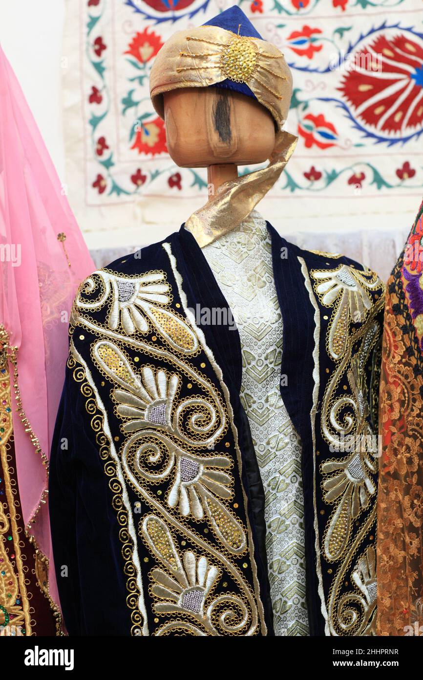 National uzbek male clothes in the shop Stock Photo - Alamy