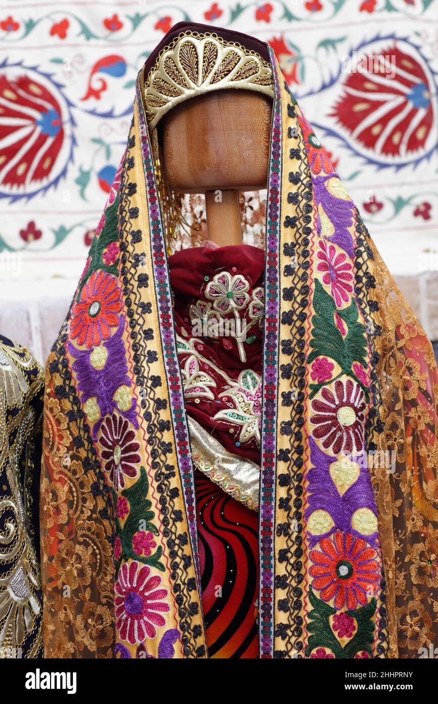 National uzbek female clothes in the shop Stock Photo - Alamy