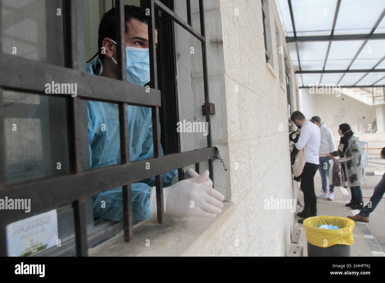 A Palestinian health worker wearing a personal protective Equipment ...