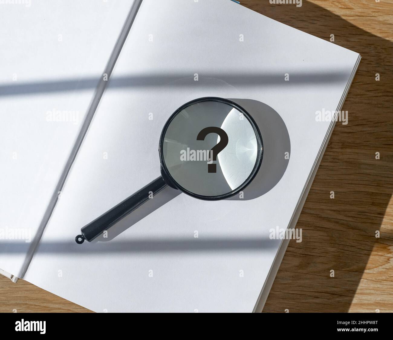 Question mark on book hi-res stock photography and images - Alamy