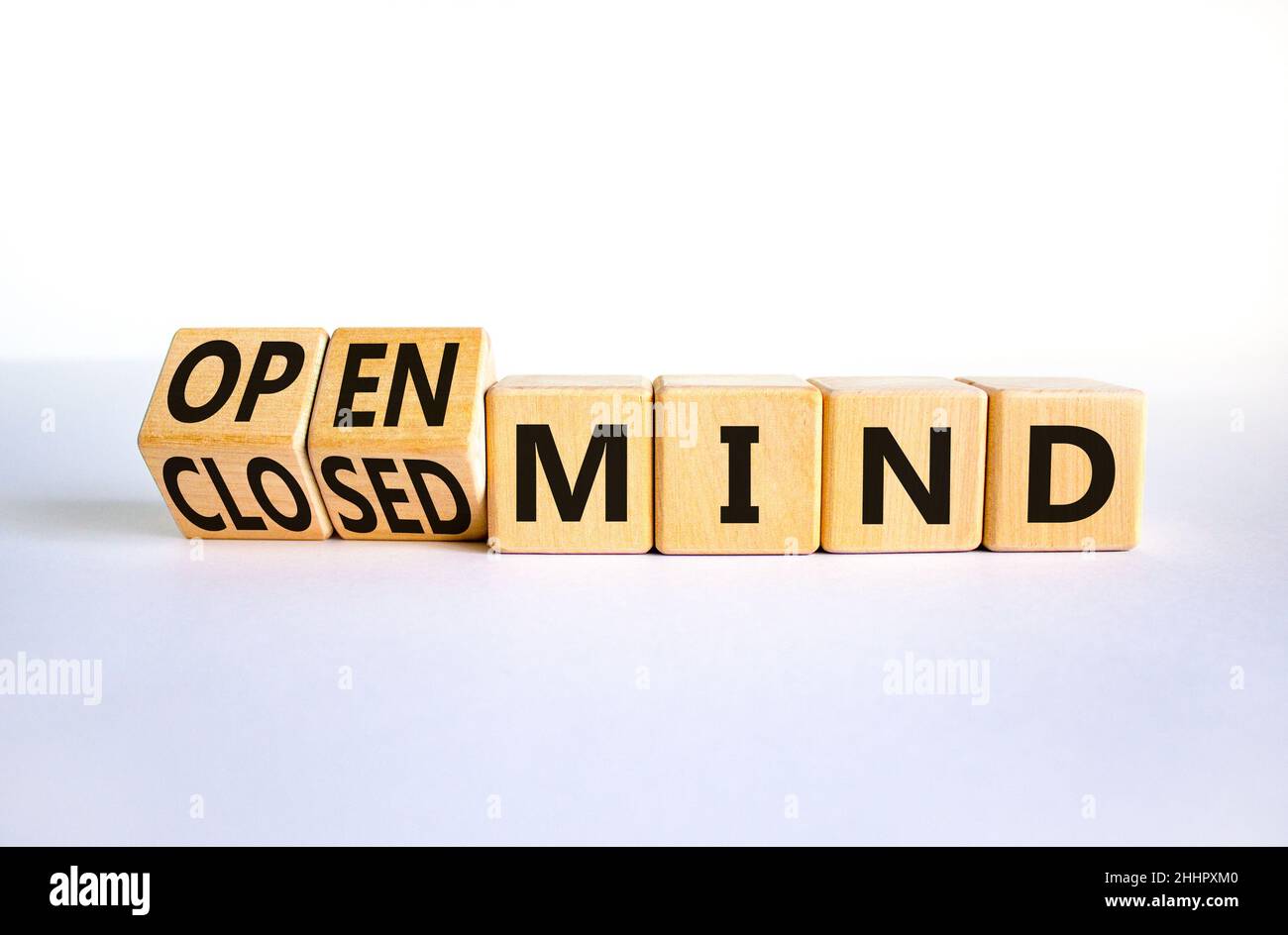 Open or closed mind symbol. Turned wooden cubes and changed concept ...