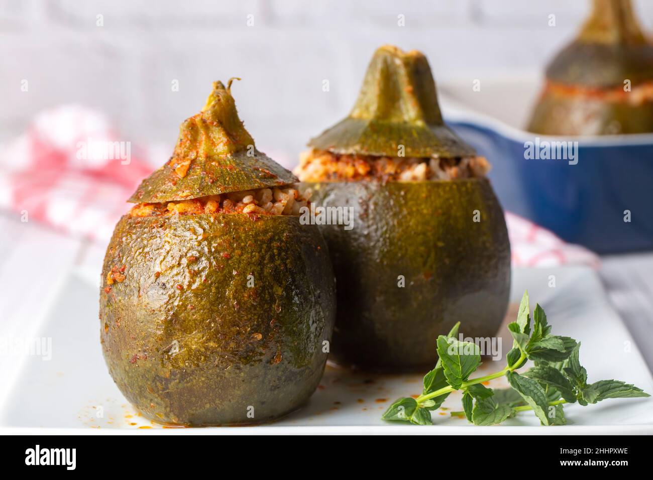 Zucchini stuffed with meat, rice and vegetables. Traditional delicious ...