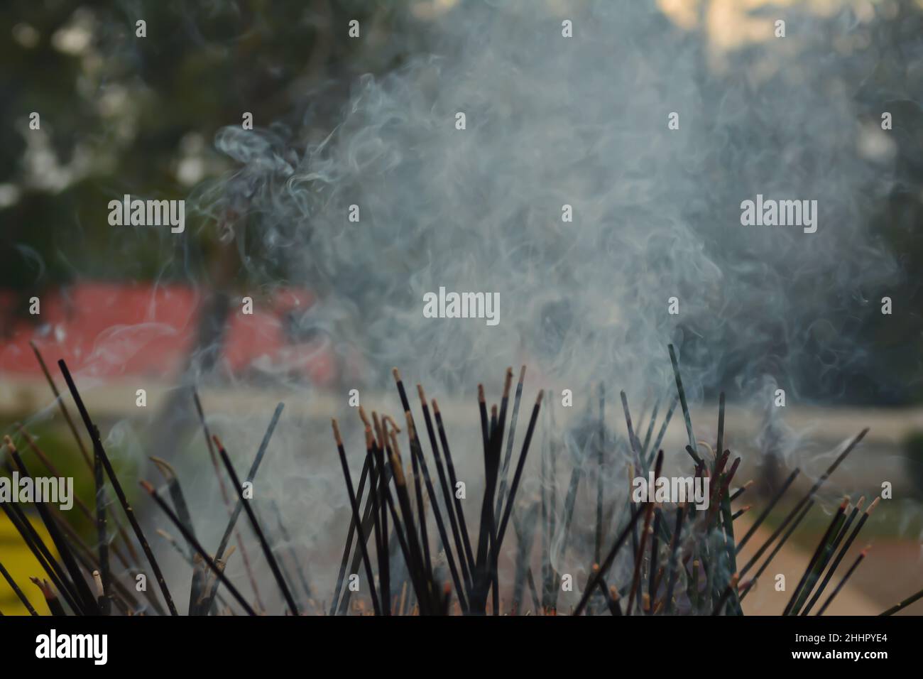 Scented incense sticks burning in temple area Stock Photo - Alamy