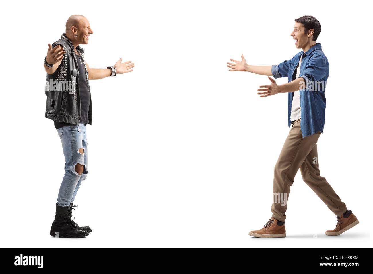 Full length profile shot of two men walking towards each other with ...