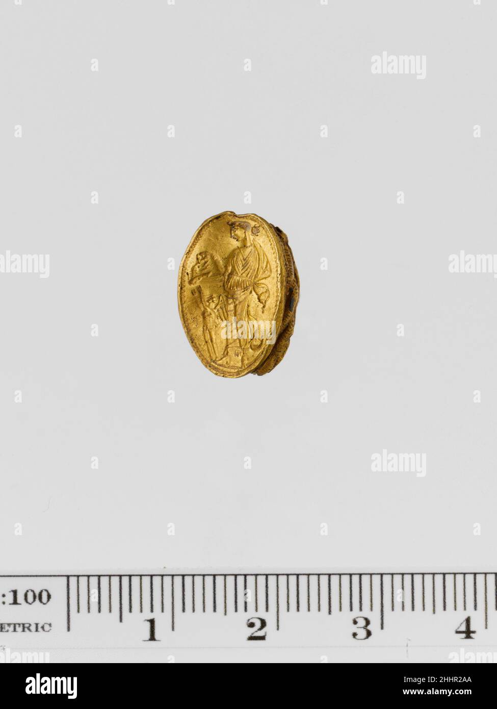 Gold scarab 4th century B.C. Greek Aphrodite holds out a bird to Eros ...