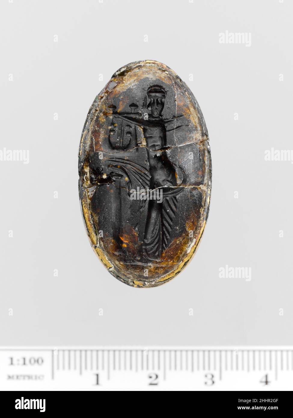 Brown glass oval set in a gilt bronze ring 3rd–2nd century B.C. Greek ...