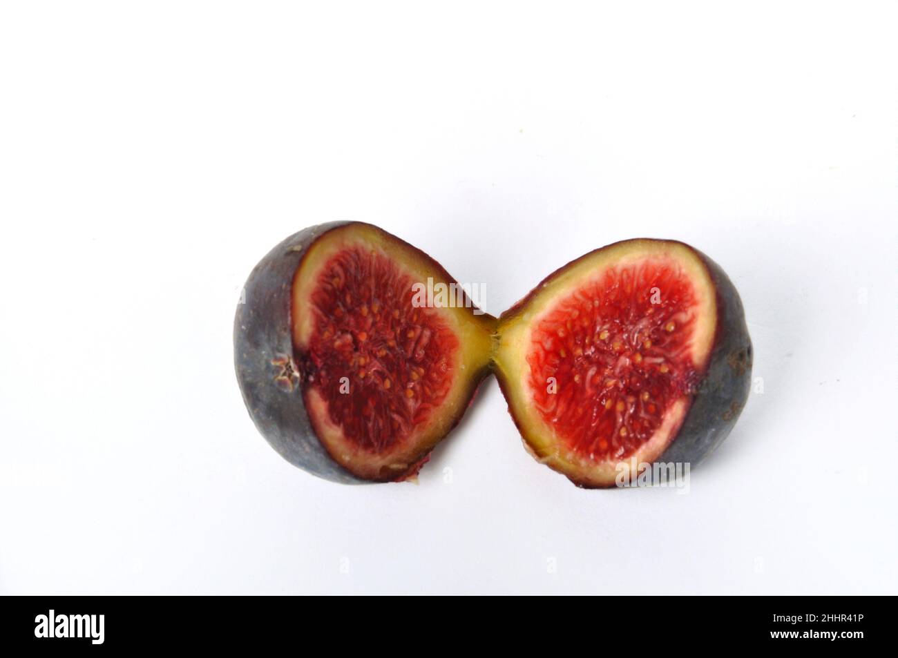 Spanish figs on a white background Stock Photo - Alamy