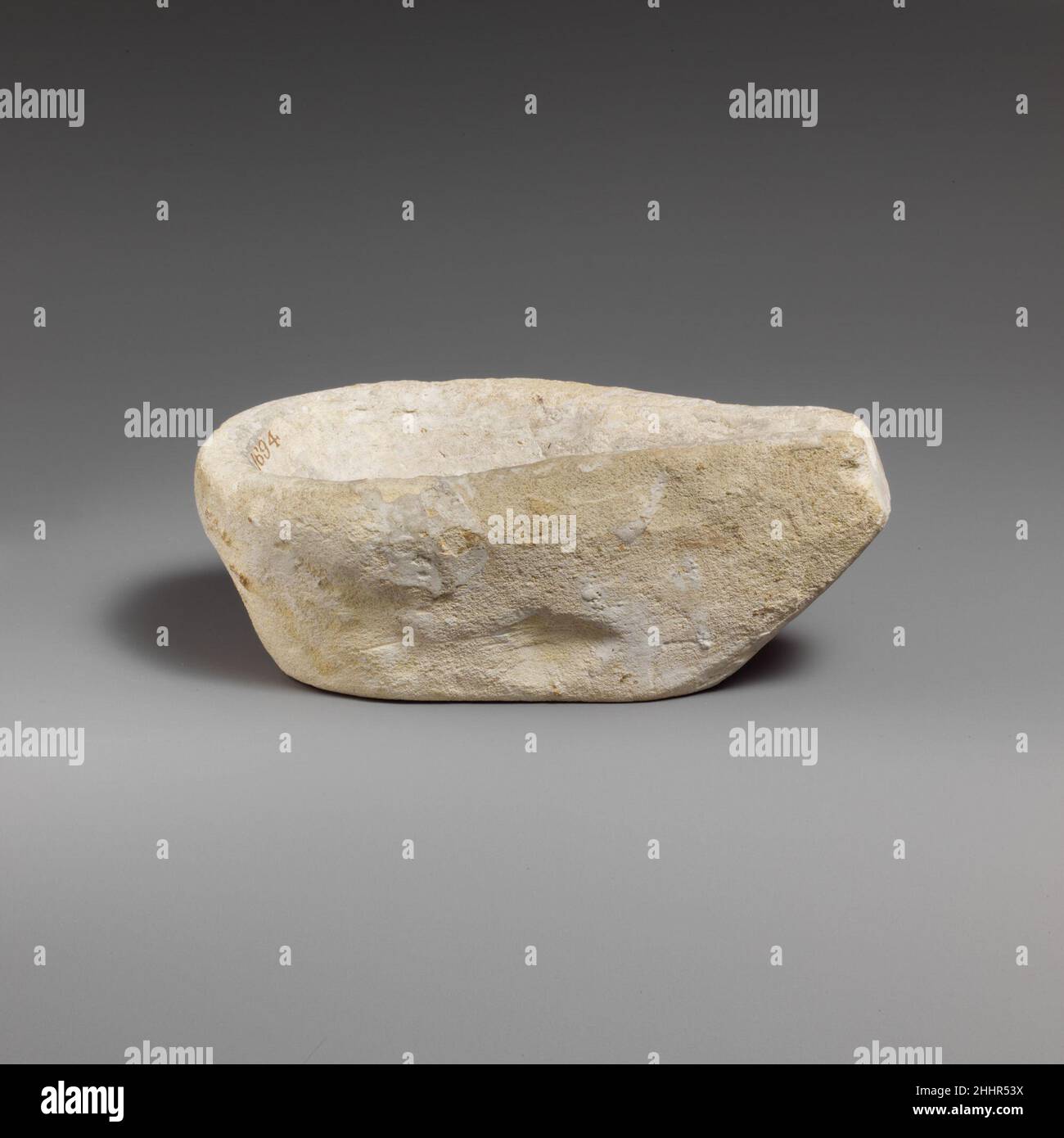 Limestone saucer lamp 5th century B.C. ? Cypriot The saucer lamp has an ...