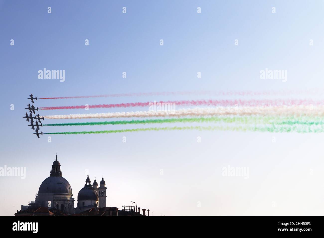 Military jets flying over Venice by releasing colors of the Italian ...
