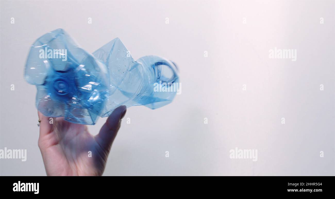Plastic Recycling - Woman Holding Plastic Bottle Waste in Hand Stock ...