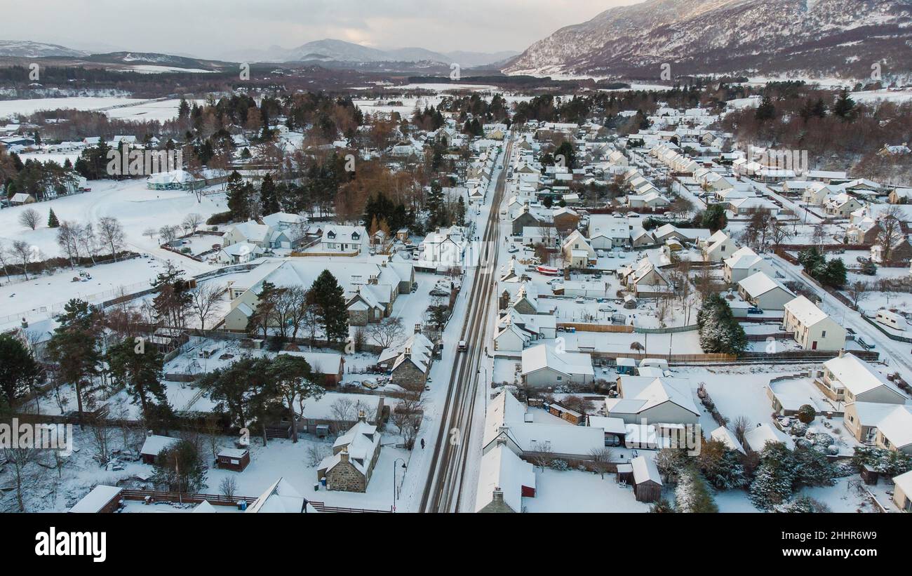 Aerial views of Newtonmore is a white out as northern Scotland endures ...