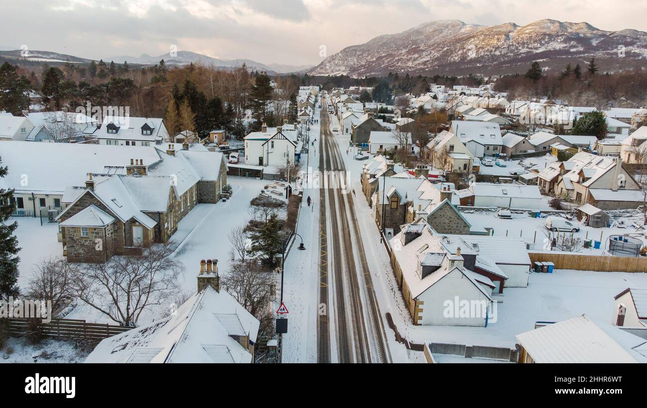 Aerial views of Newtonmore is a white out as northern Scotland endures ...