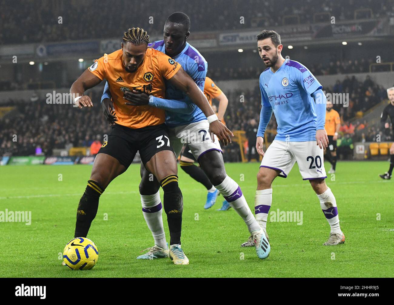 Wolves footballer Adama Traore and Benjamin Mendy of City in action ...