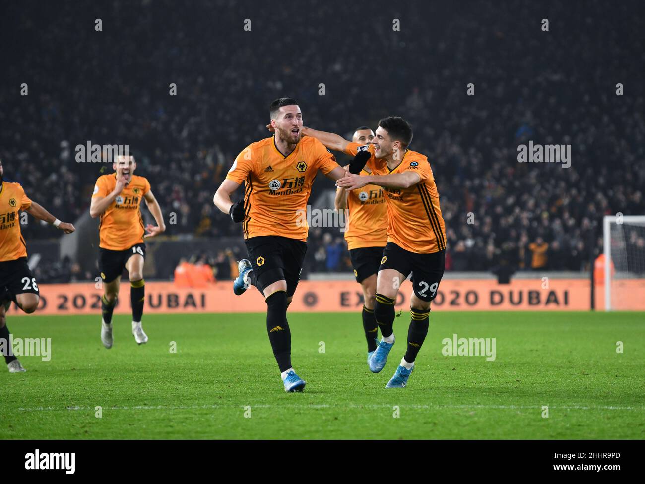 Wolves footballer Matt Doherty celebrates his winning goal with Ruben ...