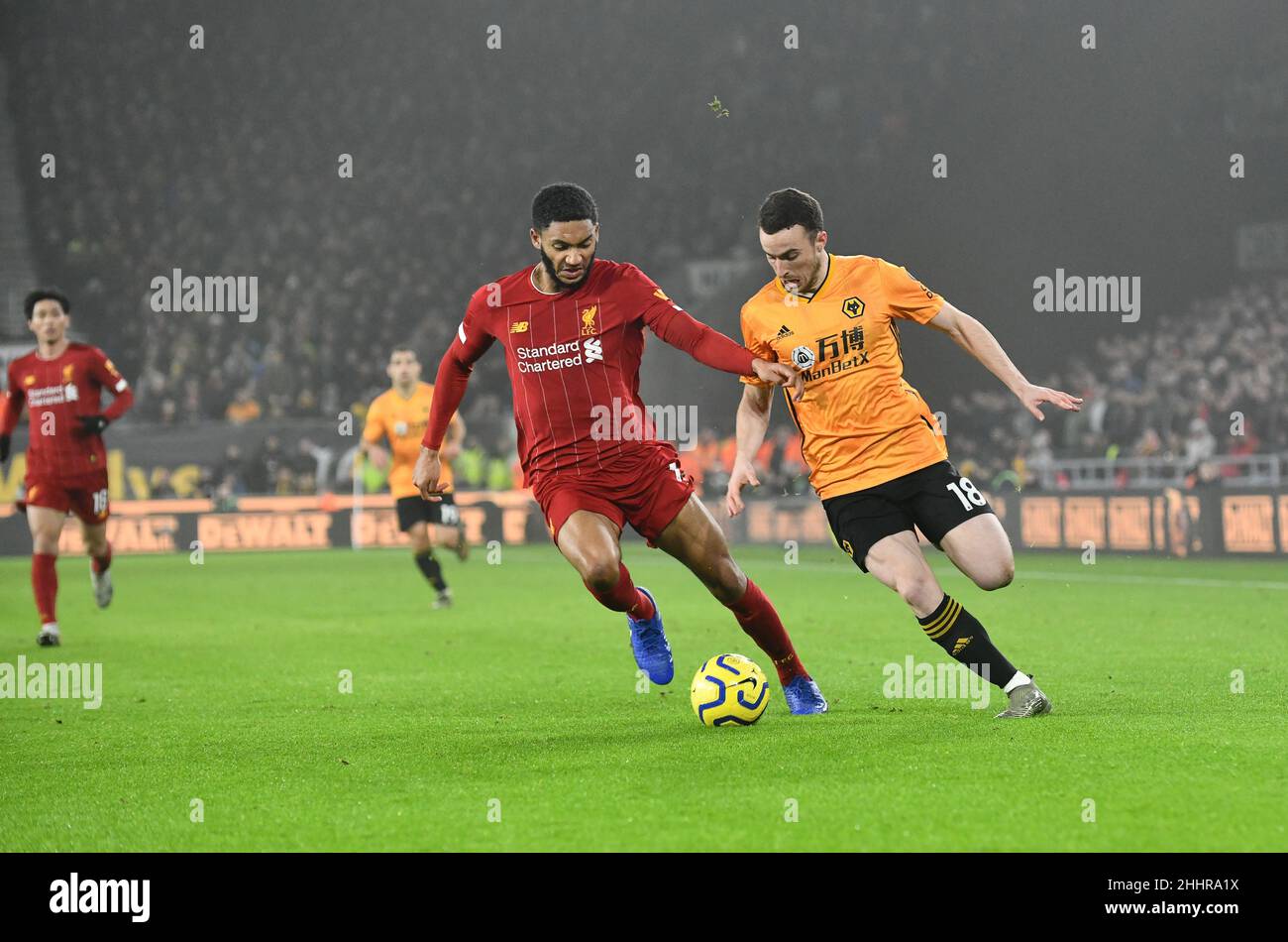 Wolves footballer Diogo Jota and Joseph Gomez of Liverpool ...